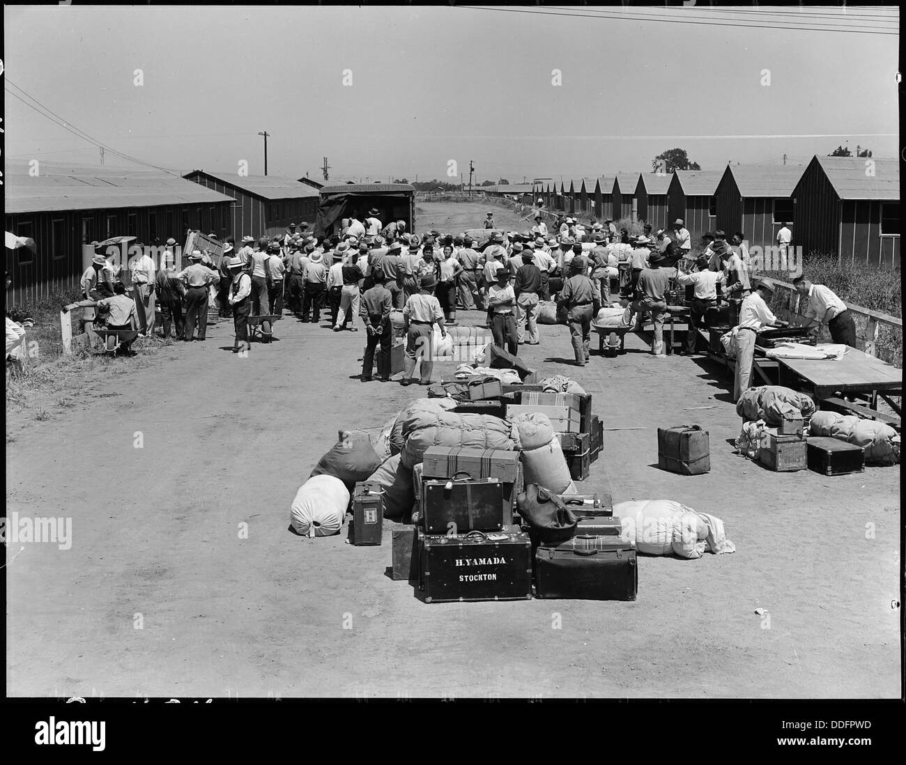 This photograph shows the first day at an assembly center in Stockton ...