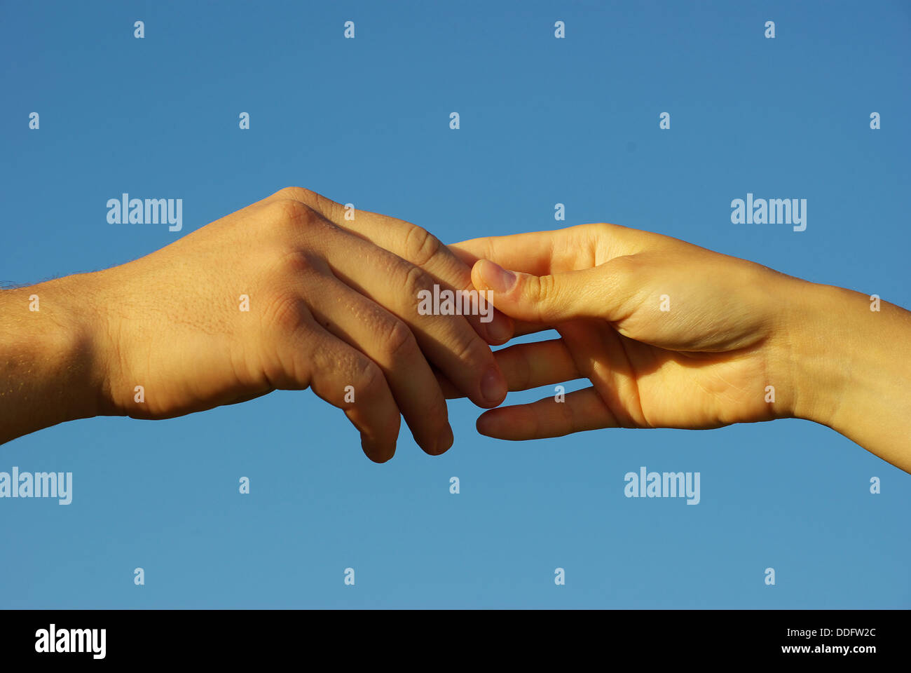 hand in a hand Stock Photo - Alamy
