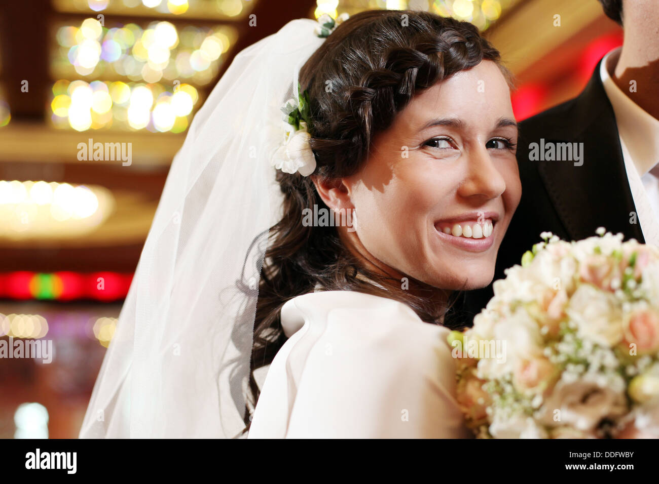Beautiful and happy couple get married indoors Stock Photo - Alamy