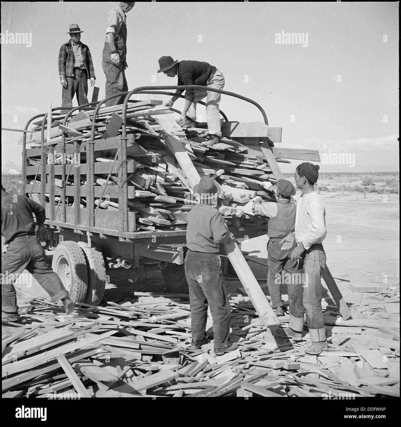 This image depicts a group of volunteer workers at the Topaz Relocation ...