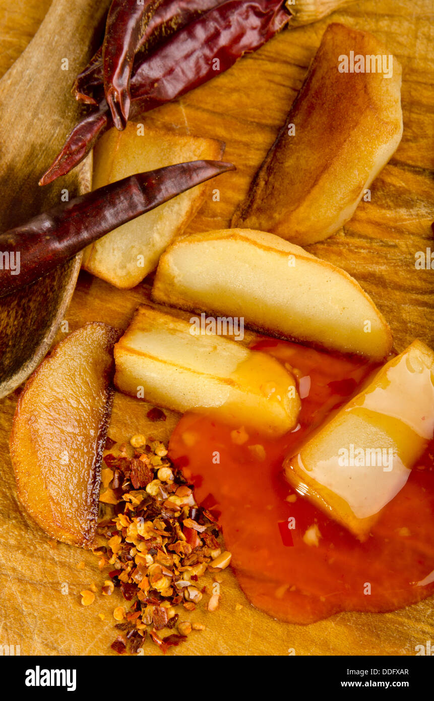 Potato wedges with chilli sauce hi-res stock photography and images - Alamy