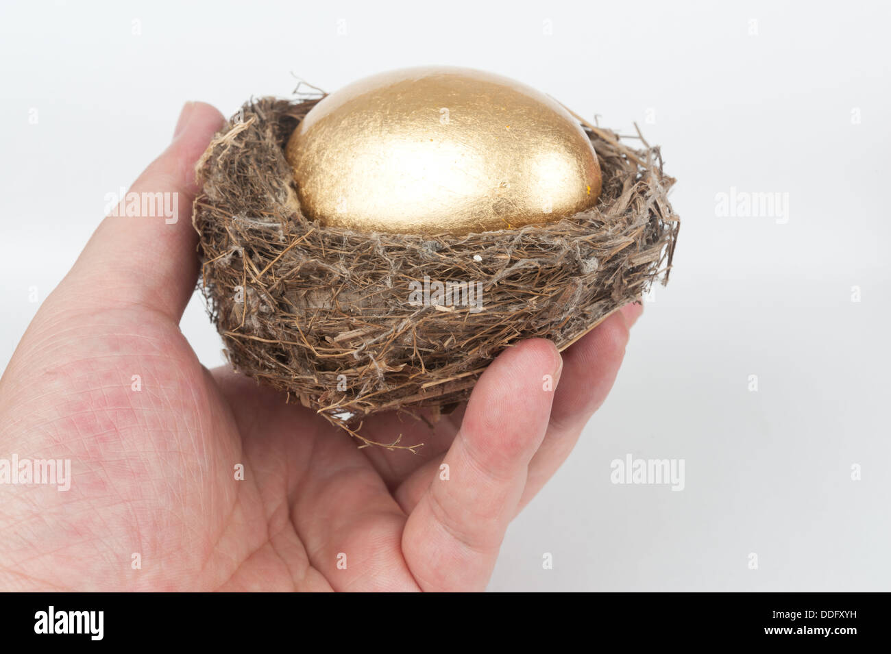 Handing an egg hi-res stock photography and images - Alamy