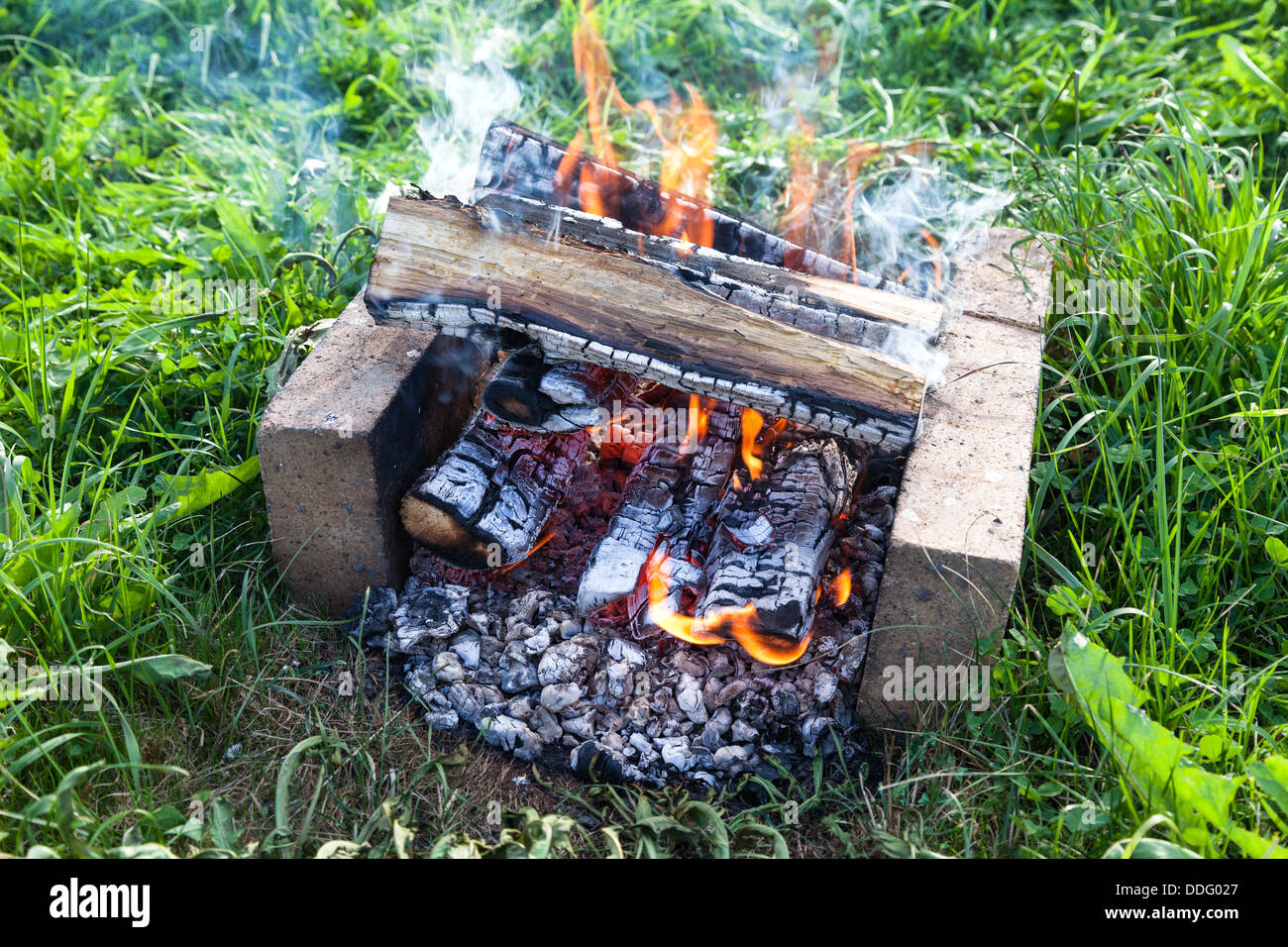Closeup of a warm fire burning in a campfire Stock Photo - Alamy