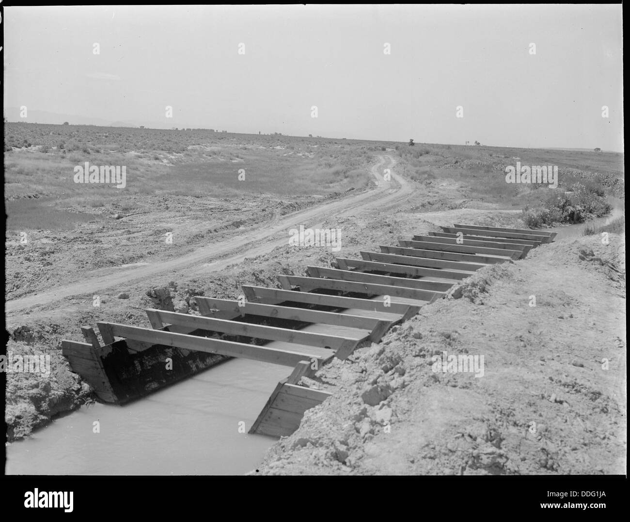 A new flume has been constructed across a drain ditch in Section 10 ...