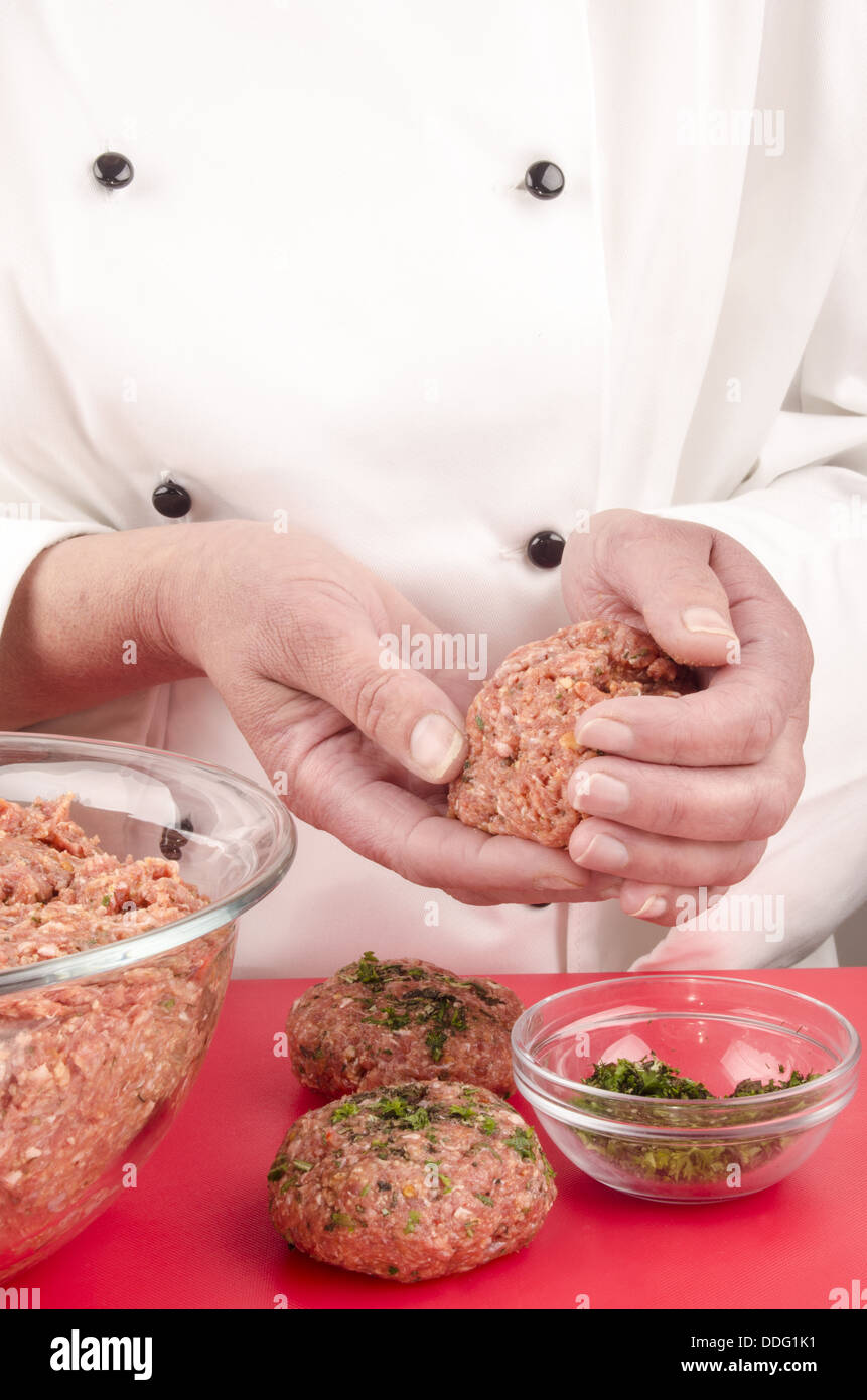 female chef preparing meat balls Stock Photo - Alamy