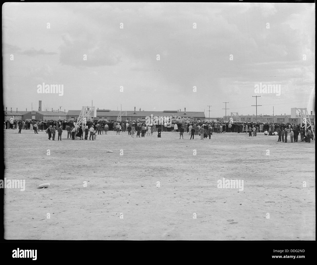 This image captures a scene from the funeral of James Wakasa in Topaz ...