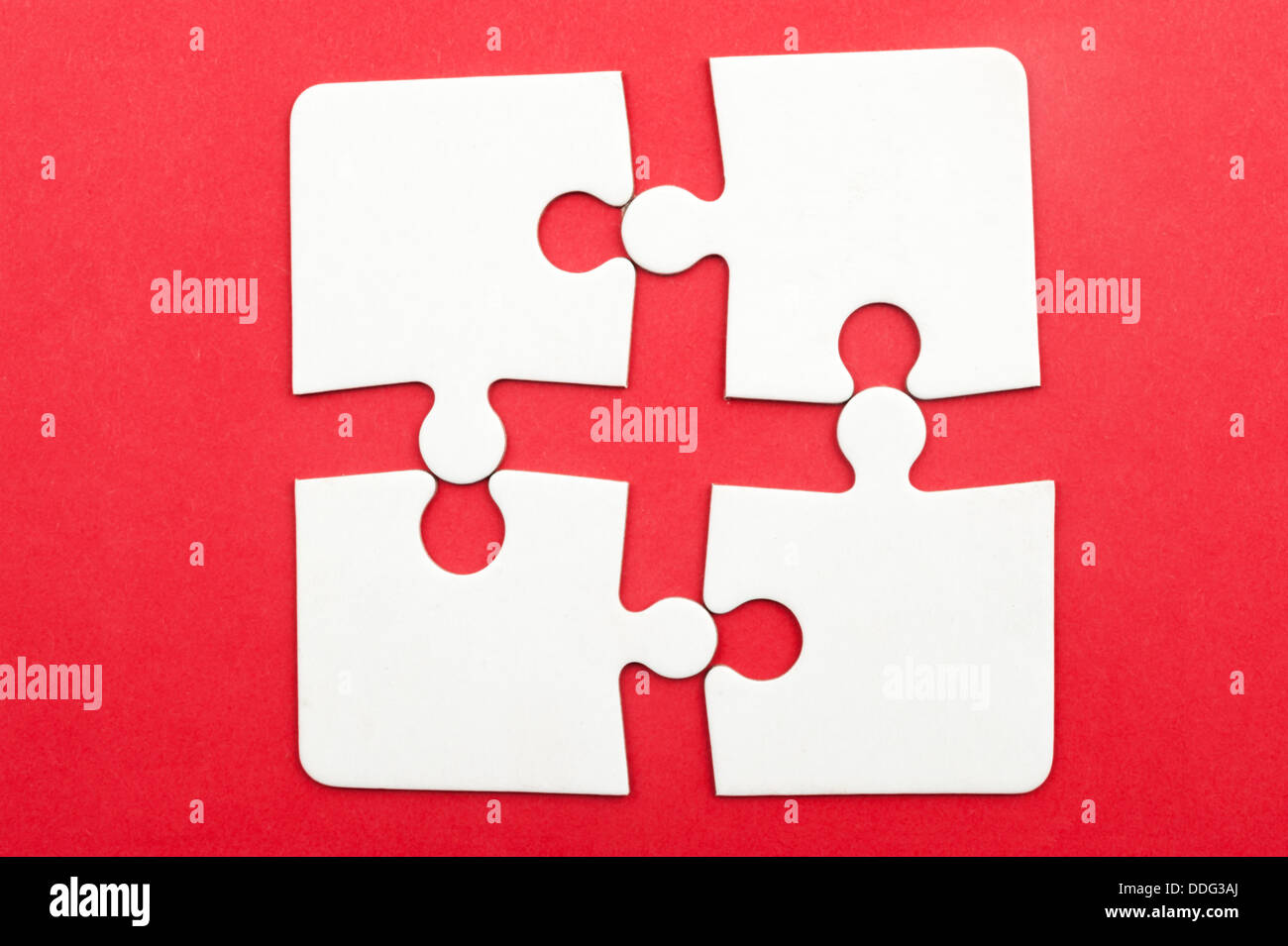 Group of white paper jigsaw puzzles Stock Photo - Alamy