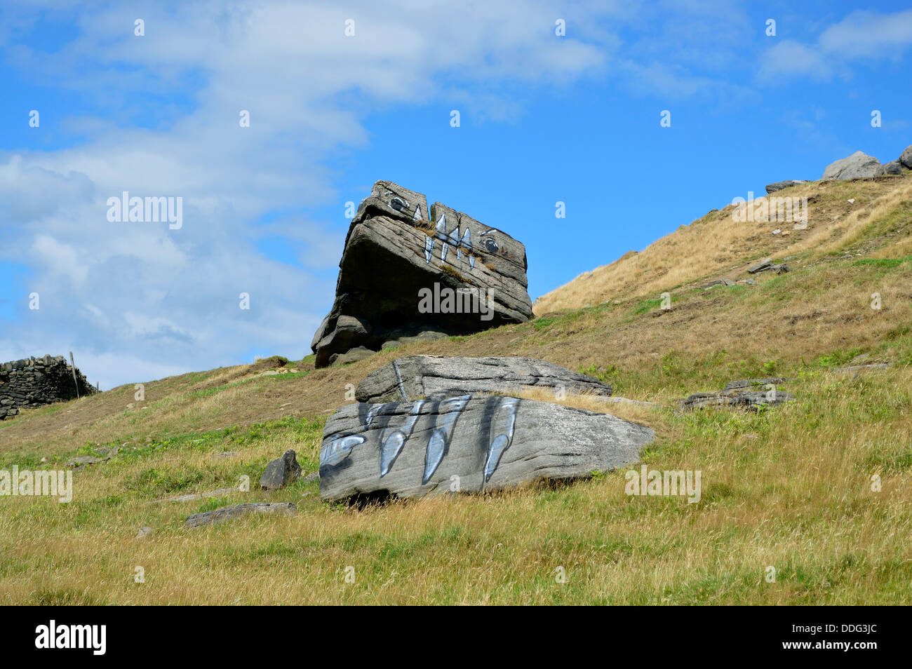 GRAFFITI ON NATURAL ROCKS ON ENGLISH HILL SIDE. ENGLAND. UK Stock Photo ...