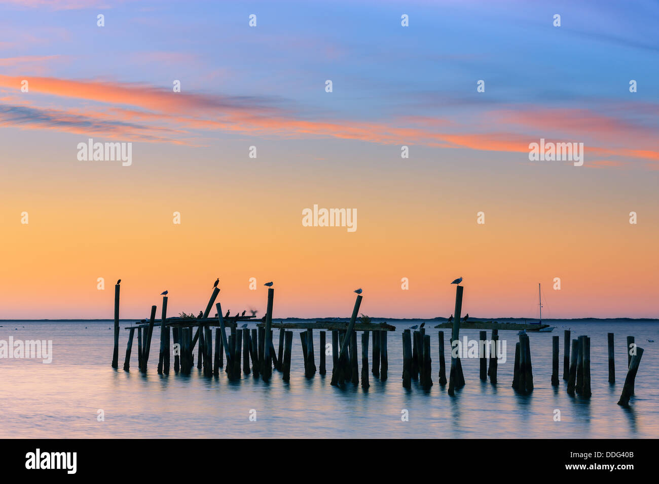 Sunrise over the old jety in Provincetown on the north of Cape Cod ...