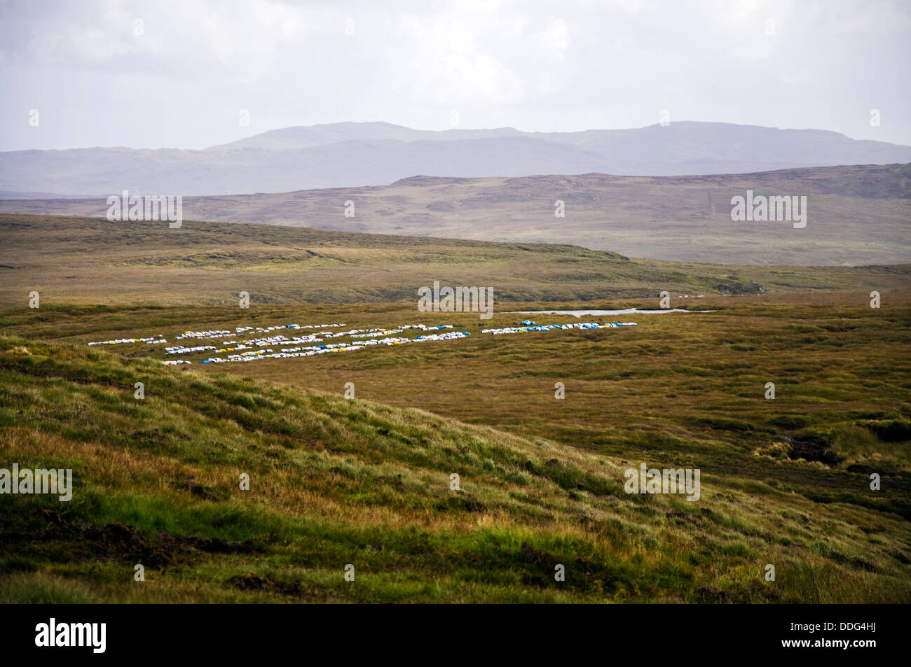 Plastic sacks bags of dried turf awaiting collection near Glencomcille ...