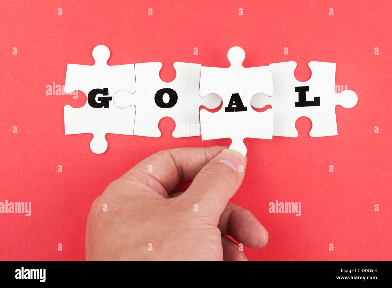 Goal word on group of jigsaw piece Stock Photo - Alamy