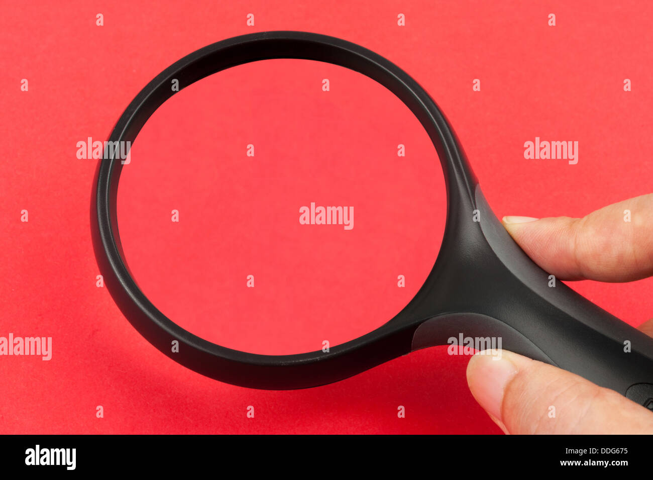 Hand holding magnifier hi-res stock photography and images - Alamy