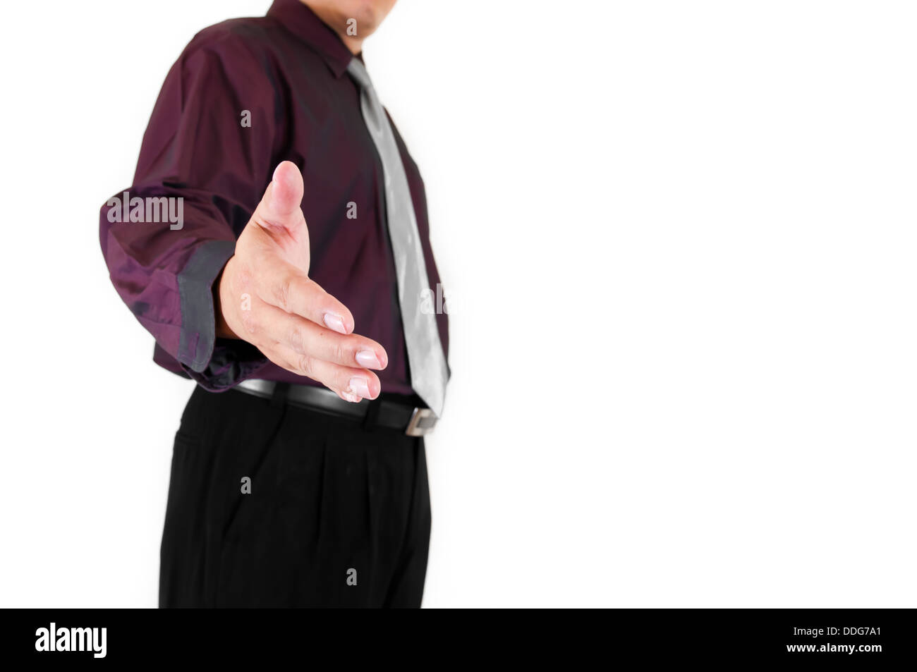 A casaul style business man reaching out to shake your hand Stock Photo ...