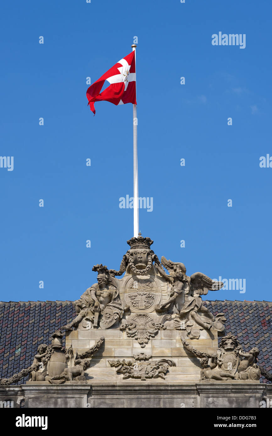 Danish flag flying from the Amalienborg palace in Central Copenhagen ...