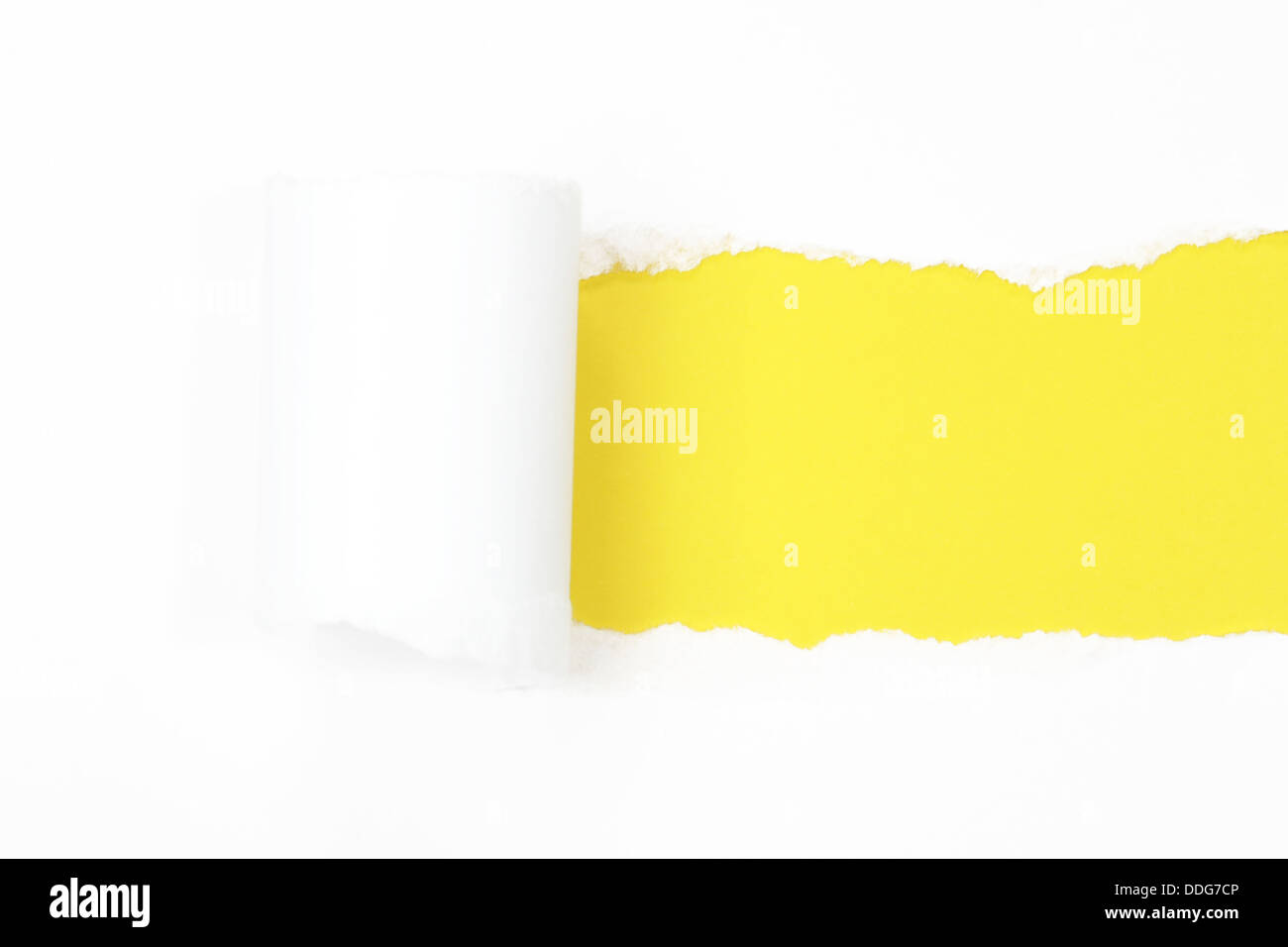 teared paper with yellow copy space Stock Photo - Alamy