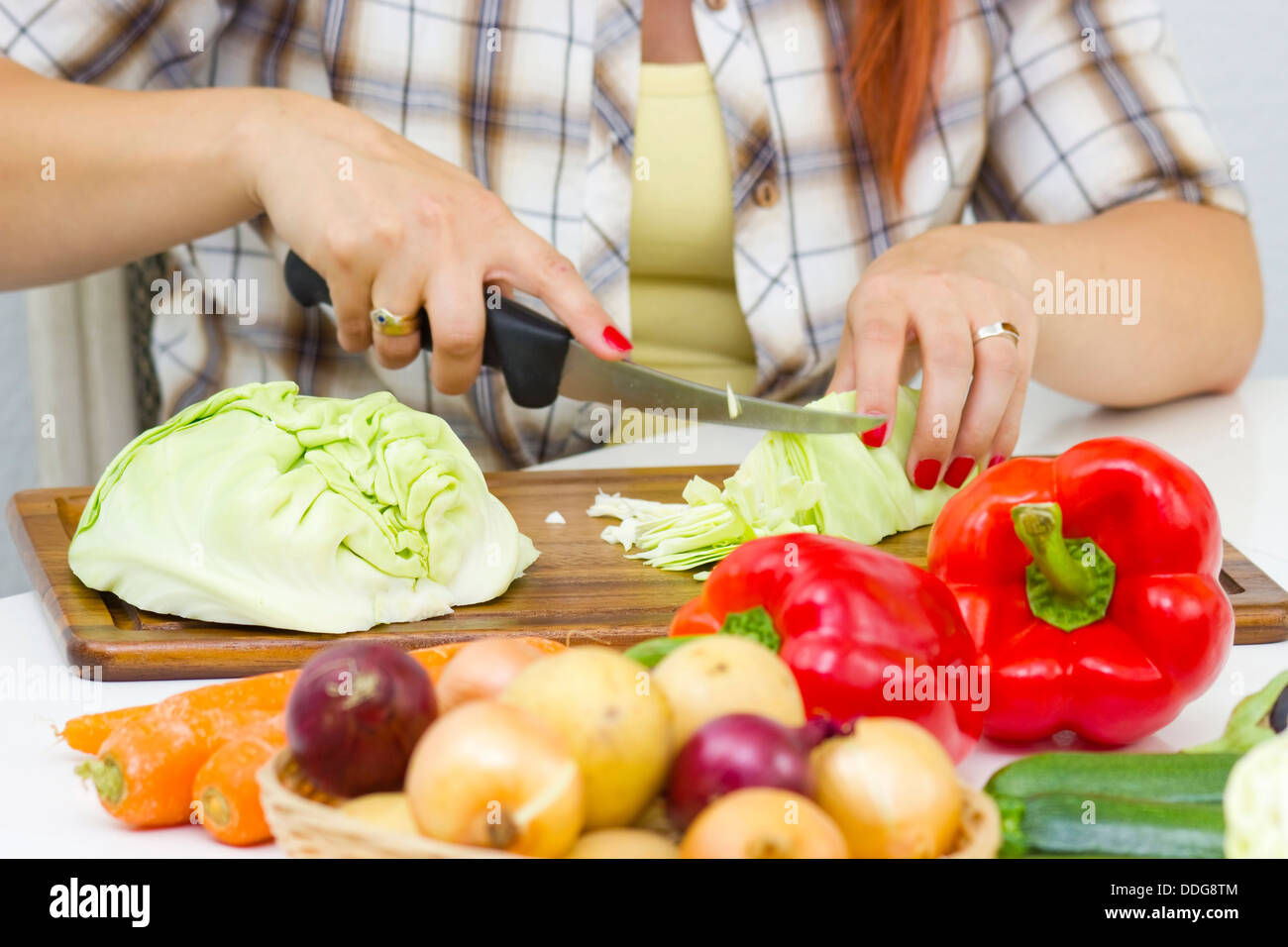 woman cutting vegetables Stock Photo - Alamy