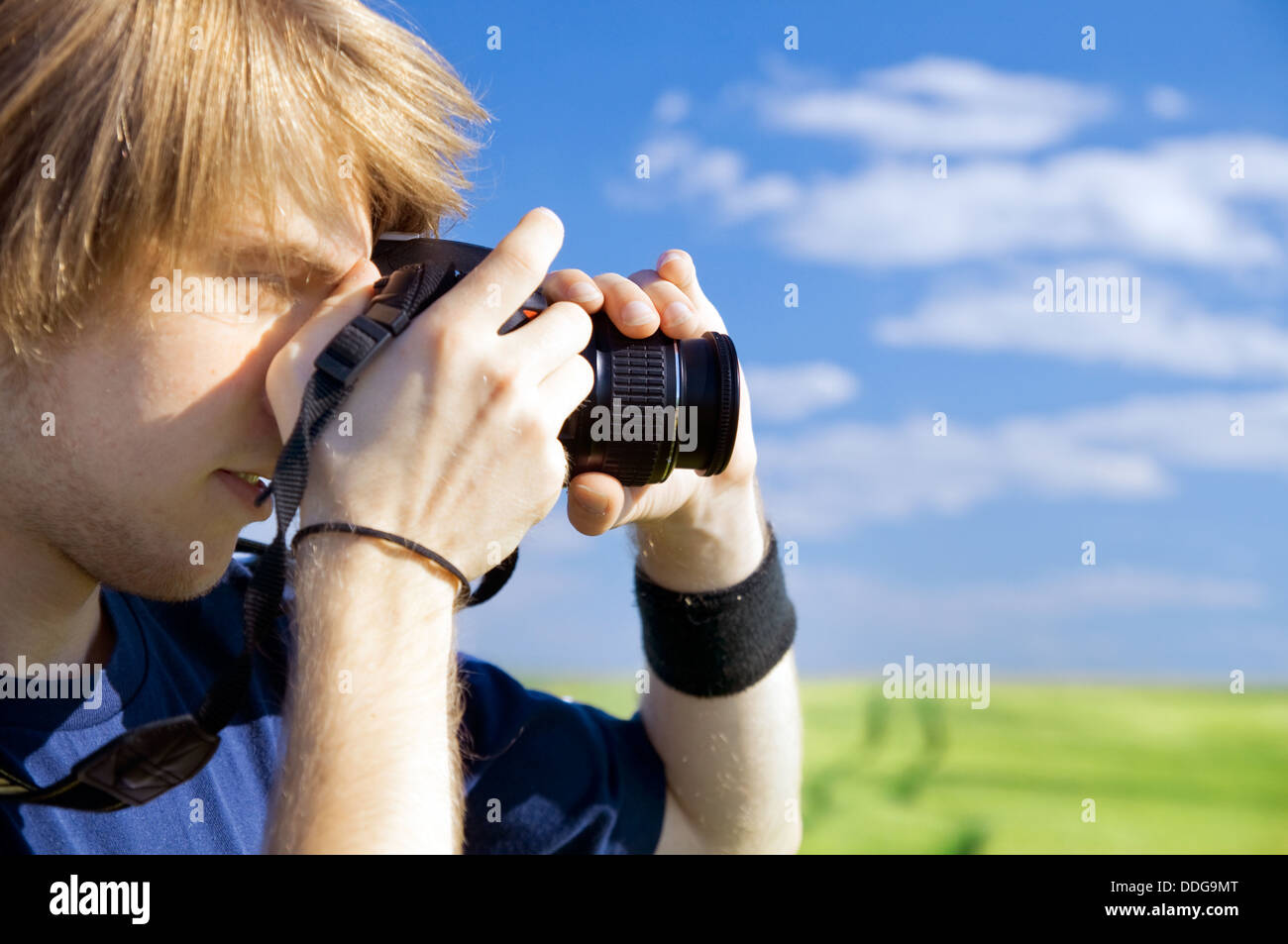 Young person taking photographs hi-res stock photography and images - Alamy