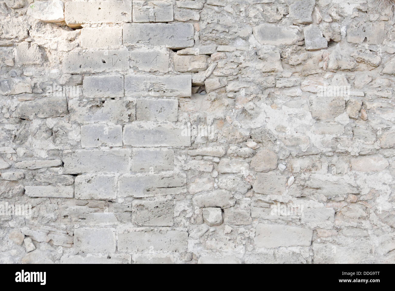 old weathered stone brick wall Stock Photo - Alamy