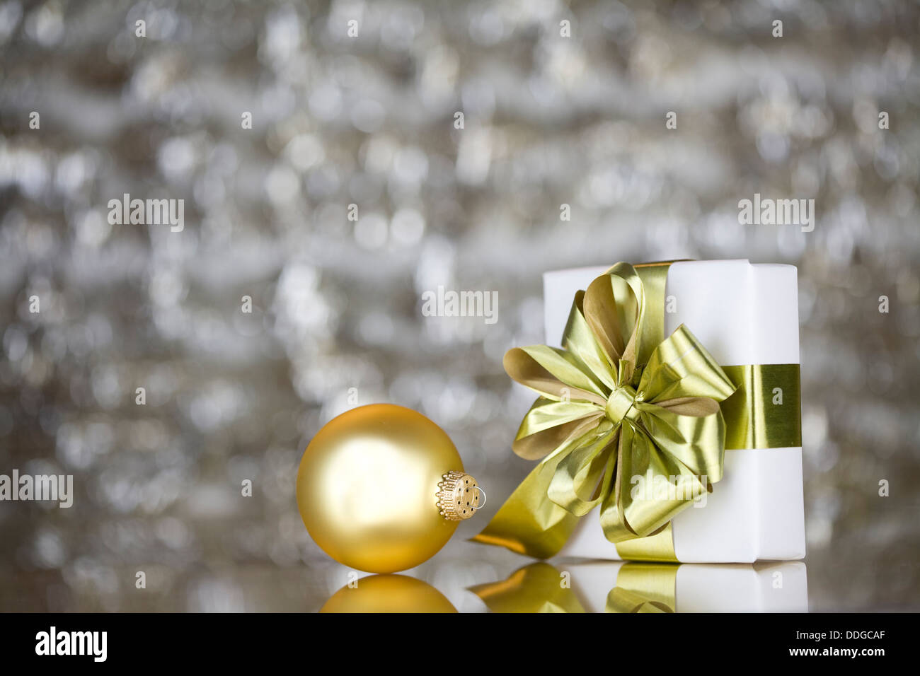 Gold present and ornament Stock Photo - Alamy