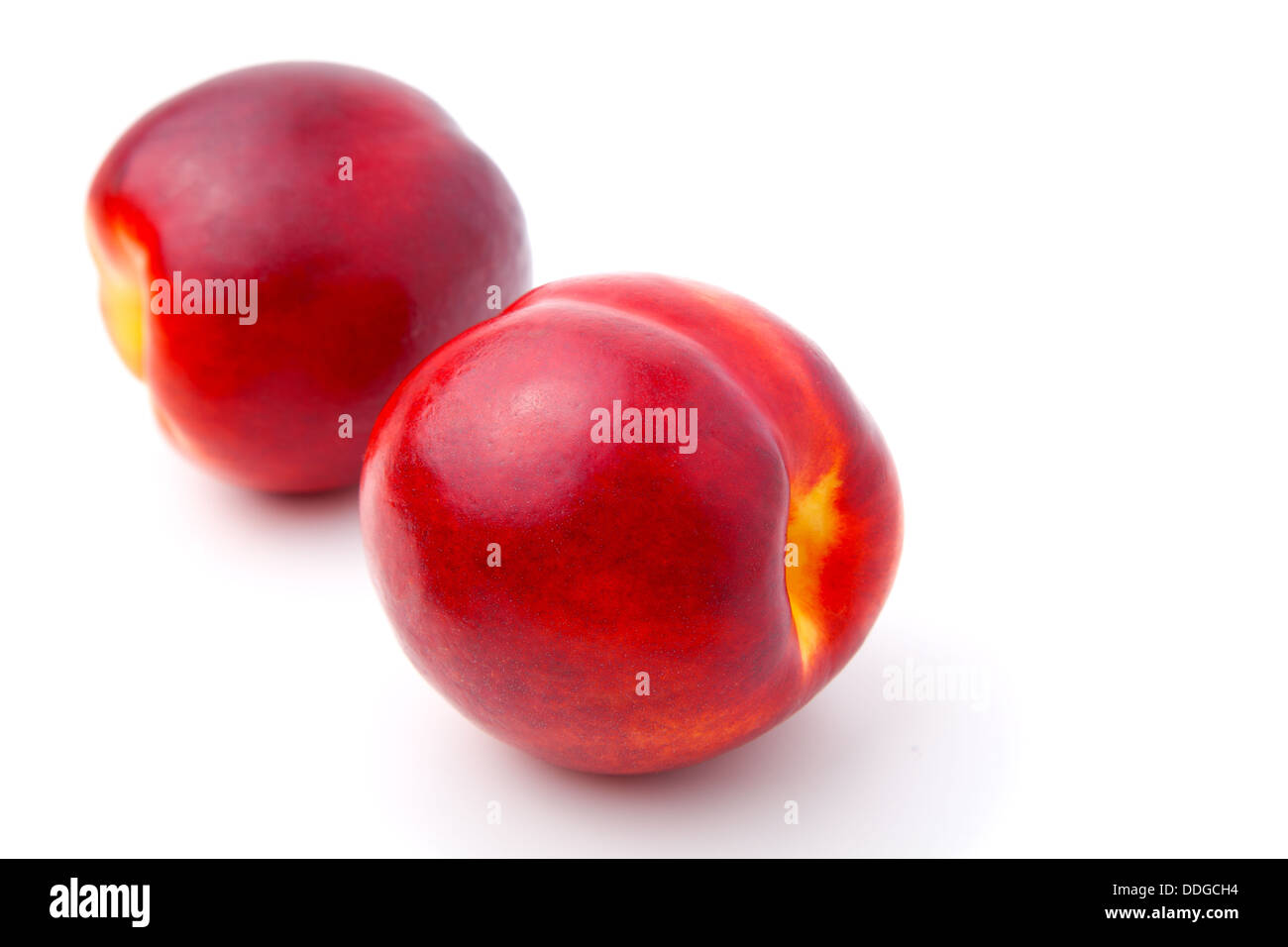 Ripe nectarine fruit isolated on white background Stock Photo - Alamy