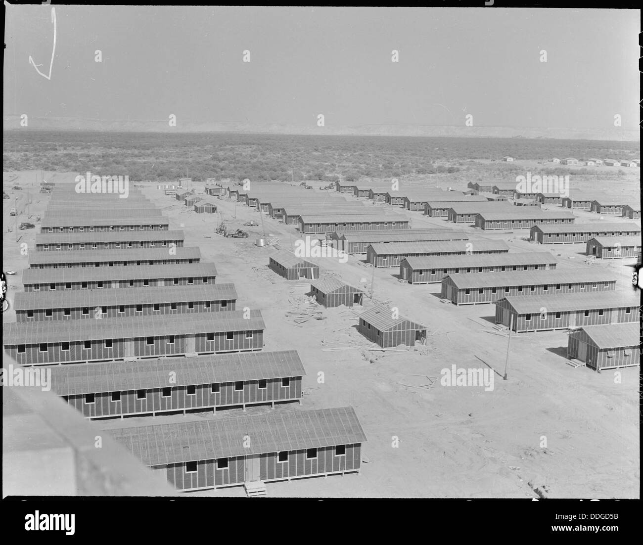 The photograph shows the living quarters of Japanese-American evacuees ...