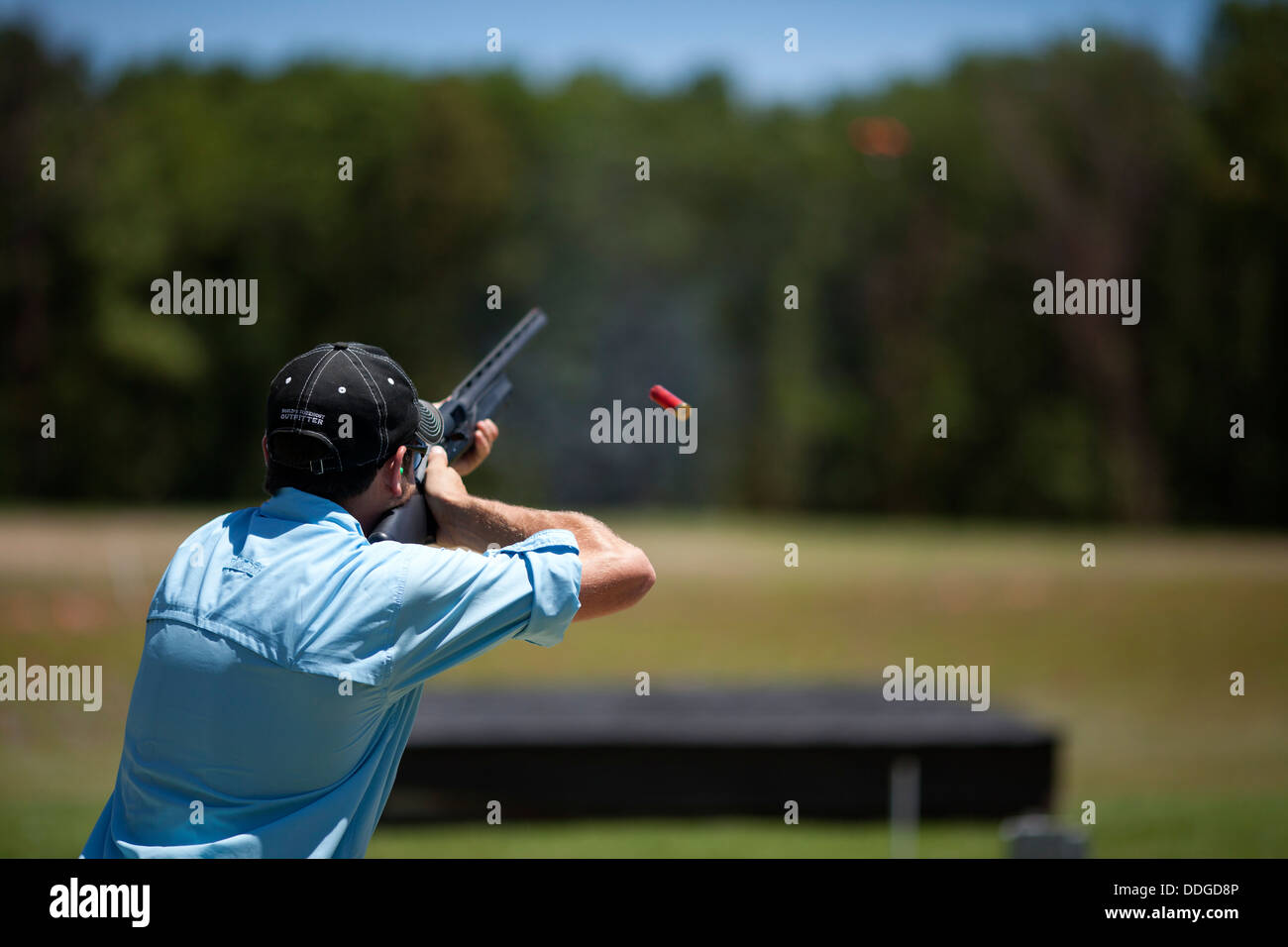 A competitor takes his shot during a trap shooting competition in Bella ...