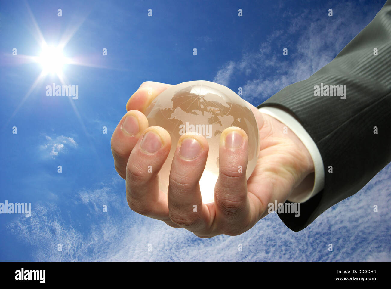 globe in hand Stock Photo - Alamy