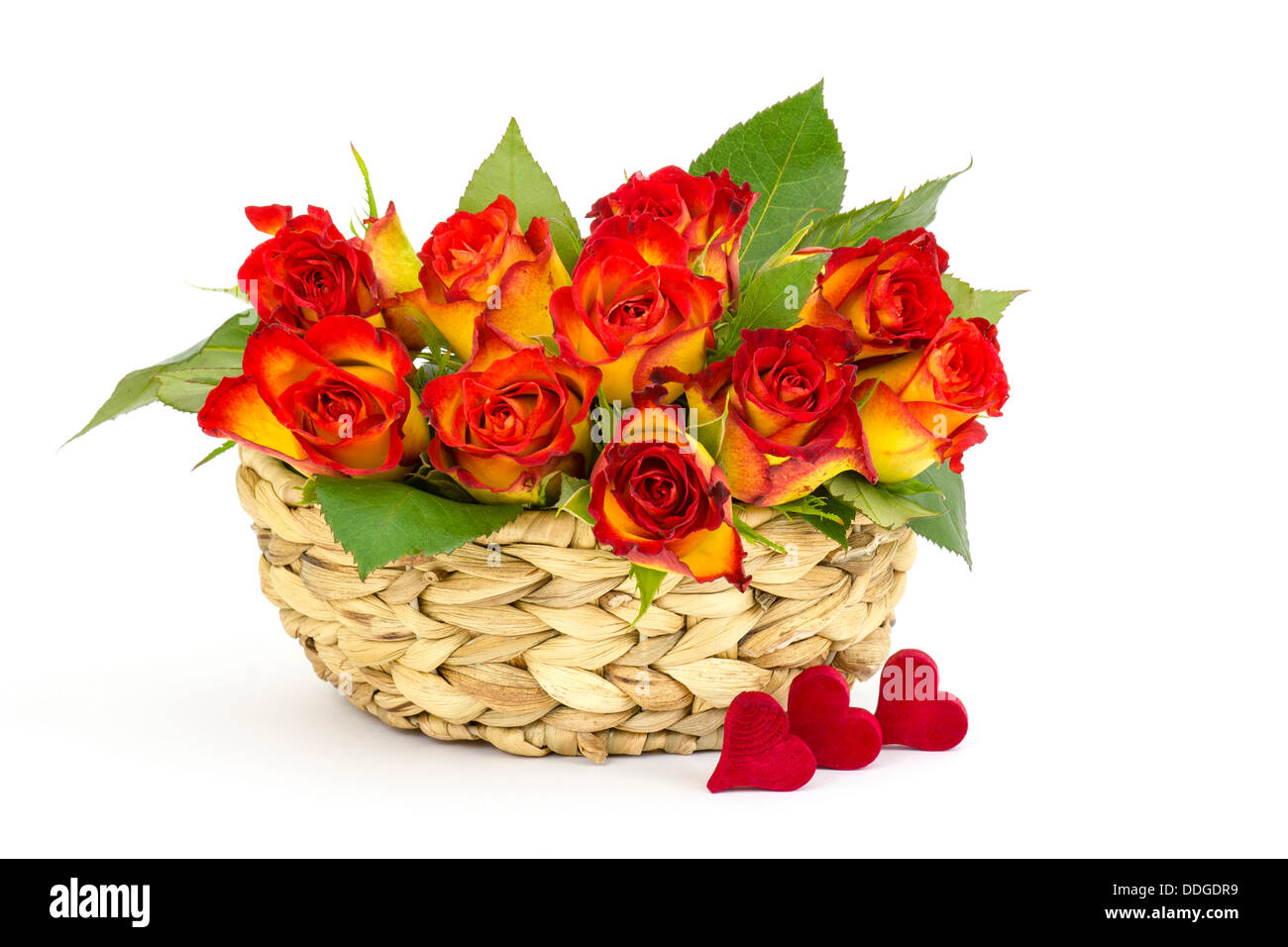 red and yellow roses in a basket Stock Photo - Alamy
