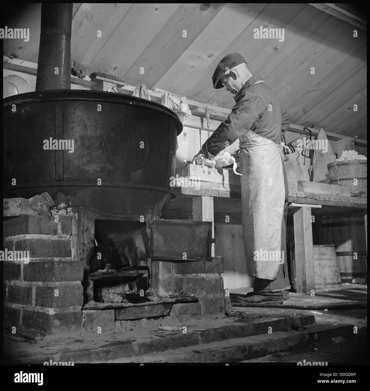 Butcher in slaughterhouse Black and White Stock Photos & Images - Alamy