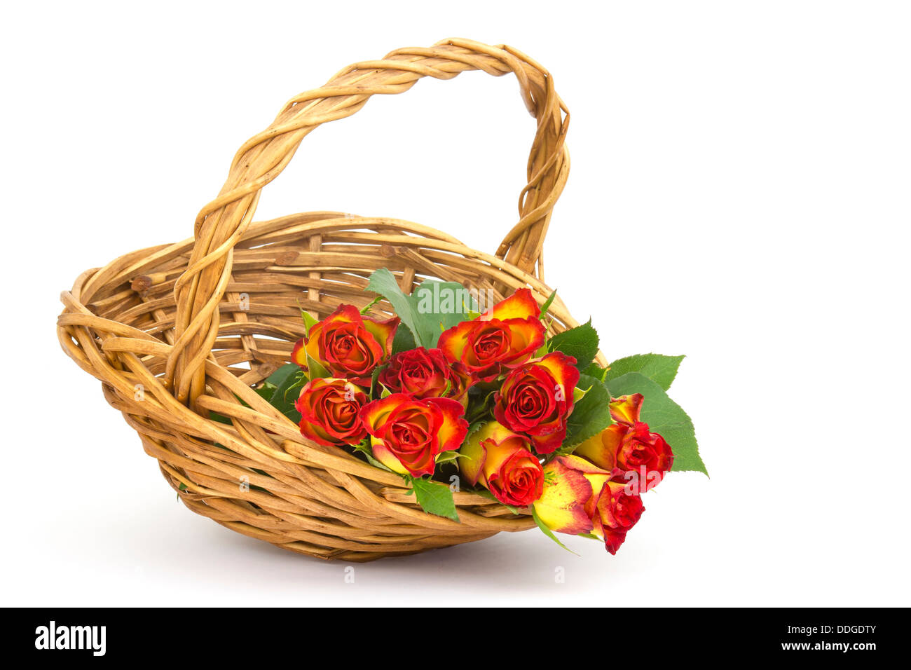 red and yellow roses in a basket Stock Photo - Alamy
