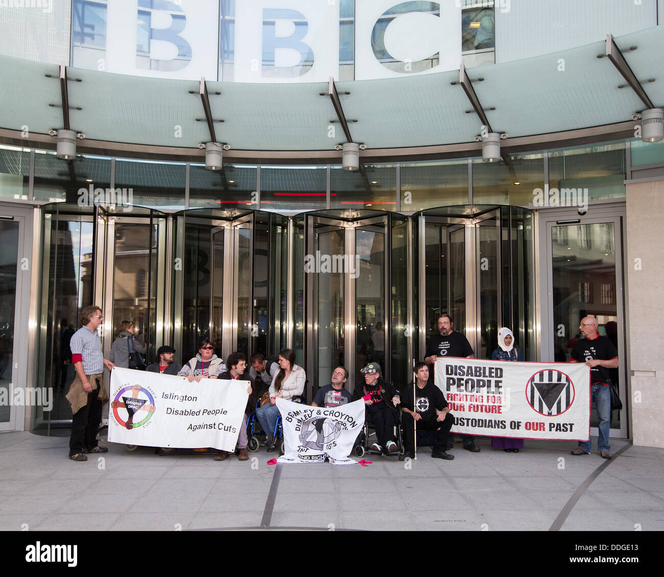 london, UK. 2nd Sep, 2013. DPAC stage a sitdown protest outside the BBC ...