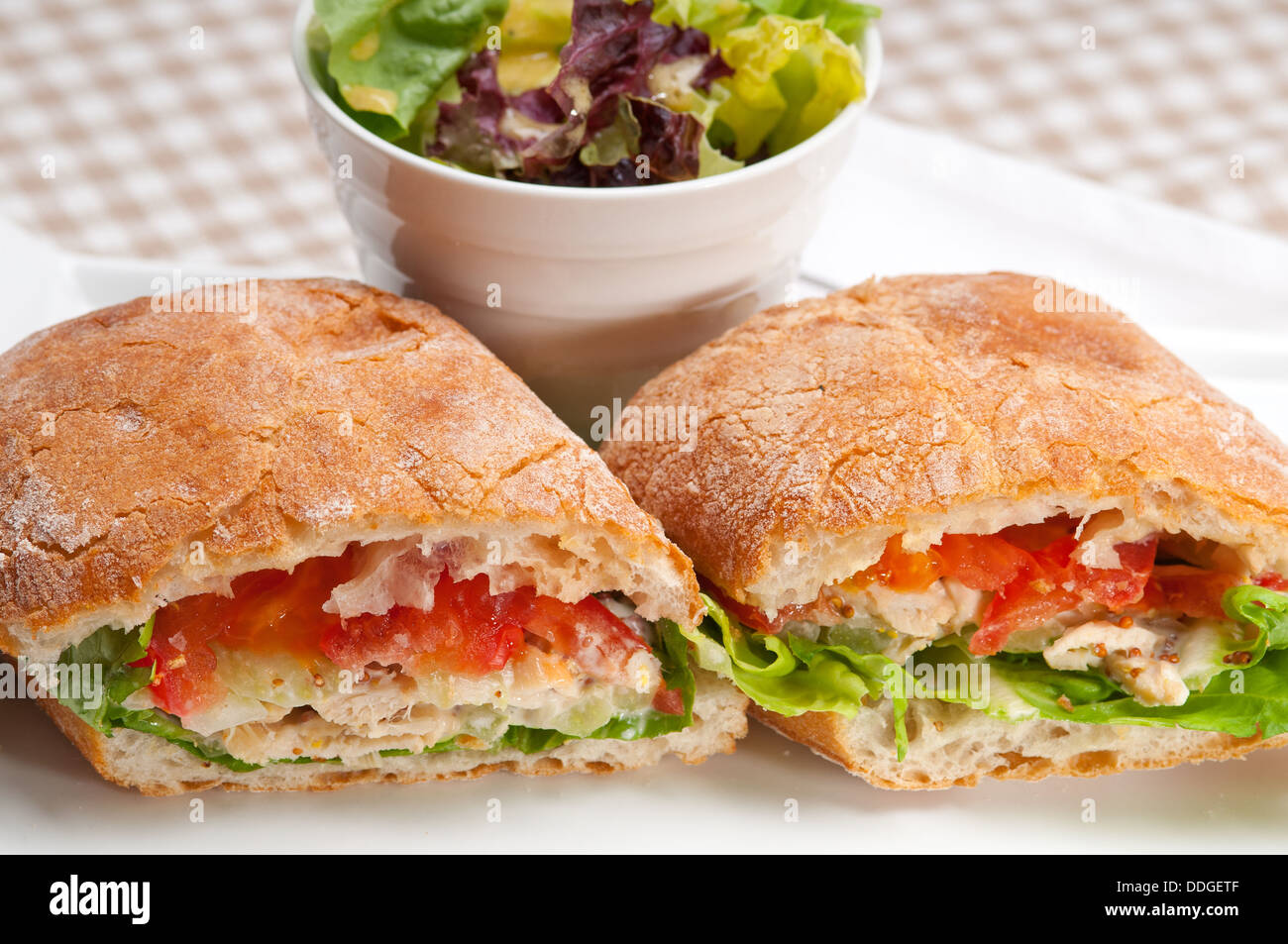 ciabatta panini sandwich with chicken and tomato Stock Photo - Alamy