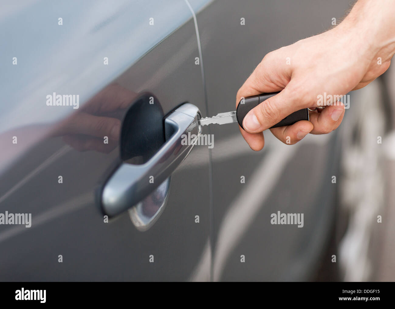 man with car key outside Stock Photo - Alamy