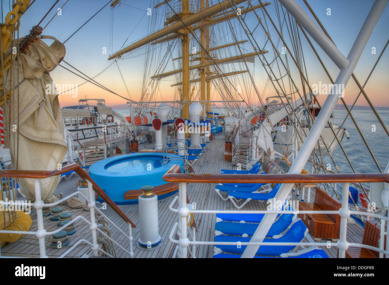 Pool and lounge chairs at the deck of a royal clipper ship, Italy Stock ...