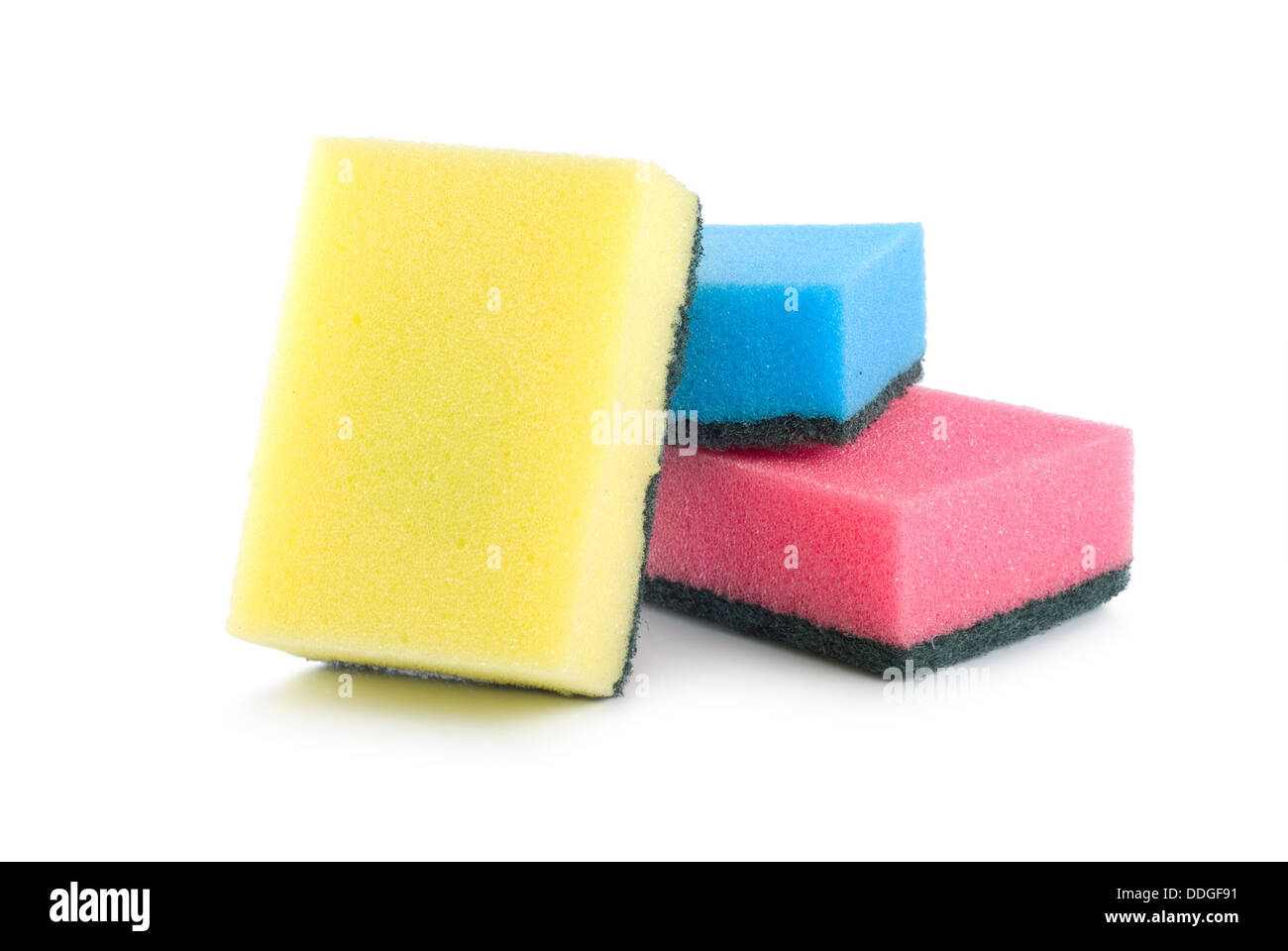 Three colored sponges isolated Stock Photo - Alamy