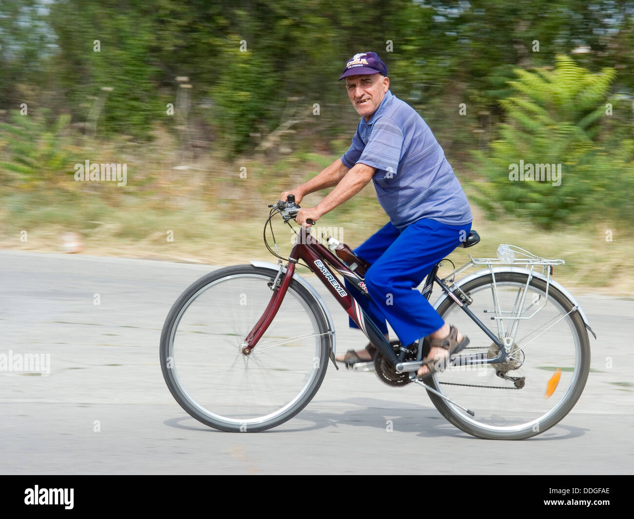 Bulgarian villager rides bike in Strandja mountains village of ...