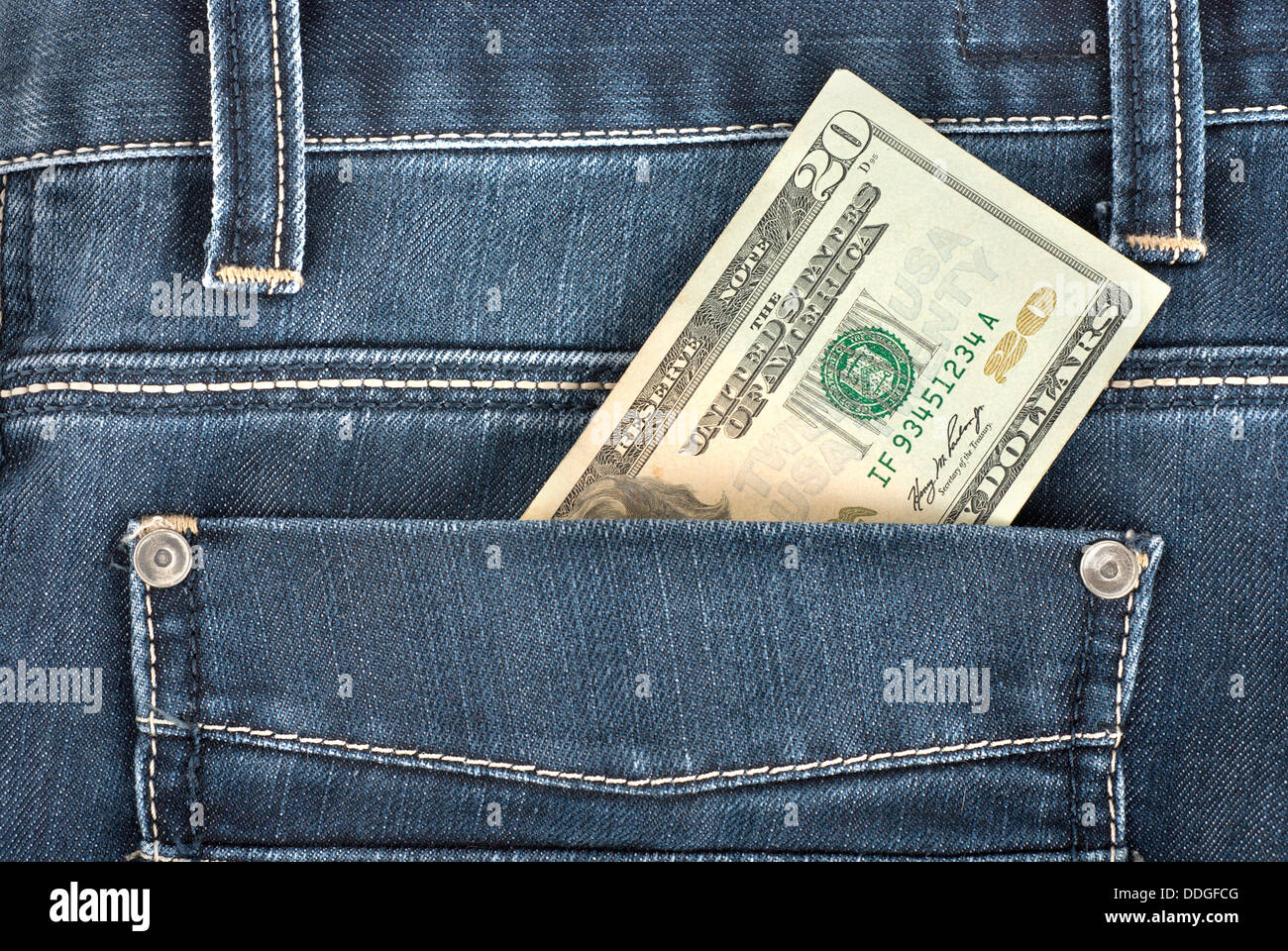 Twenty dollar in pocket Stock Photo - Alamy