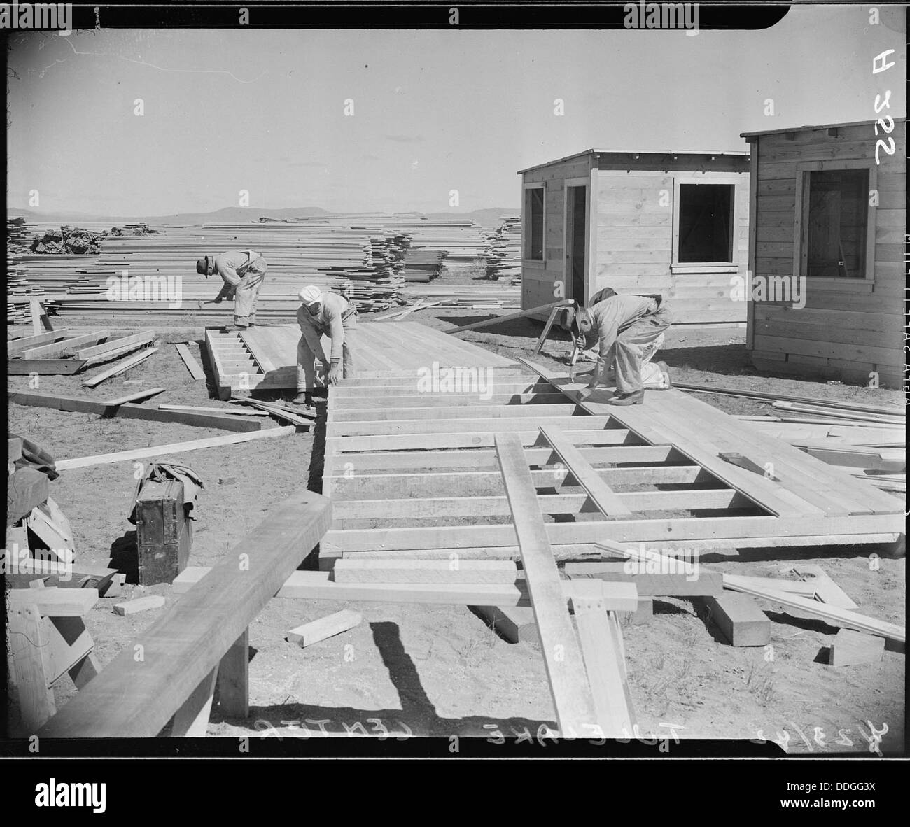 The construction of the first house at Tule Lake War Relocation Center ...