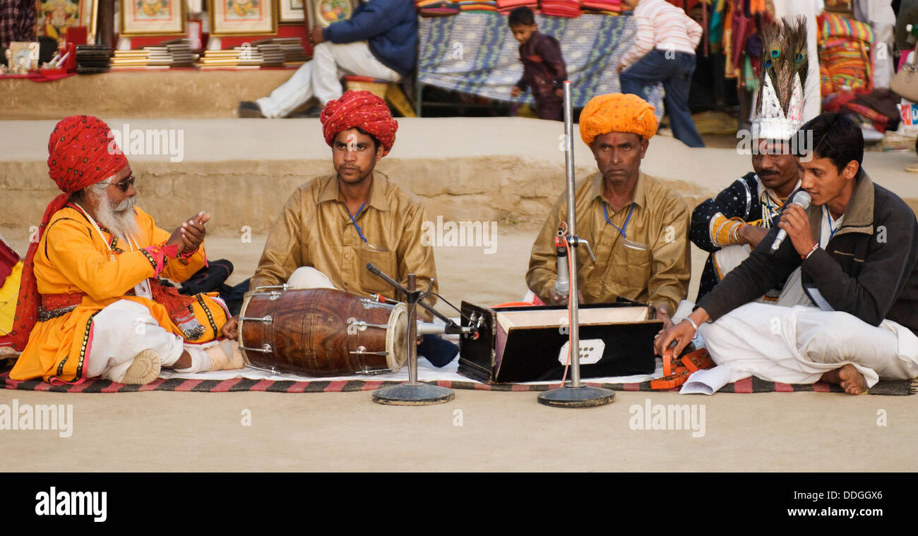 People in traditional Rajasthani dress playing music at Surajkund Mela ...