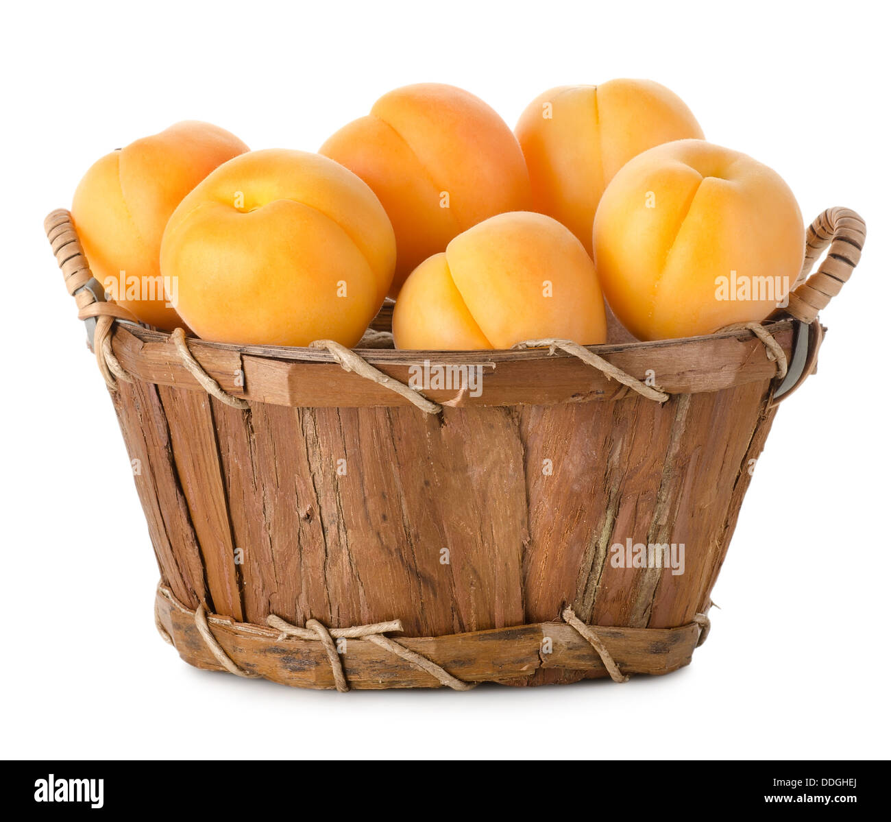 Raw apricots in a basket Stock Photo - Alamy