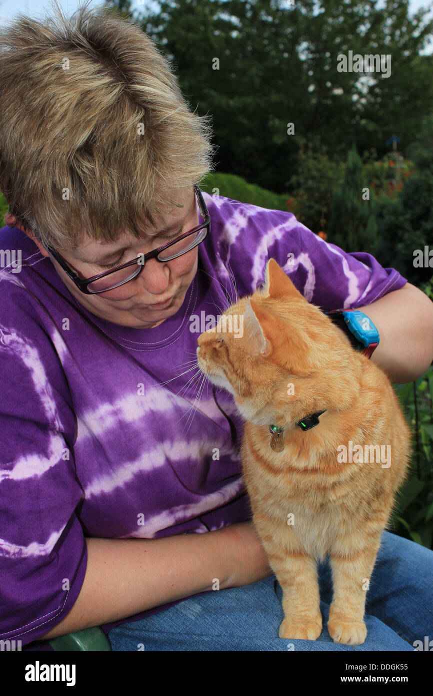 Lady and cat hi-res stock photography and images - Alamy