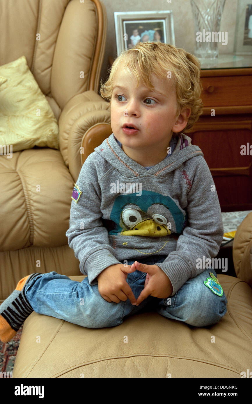 Family photos toddler boy golden hair looking Stock Photo - Alamy
