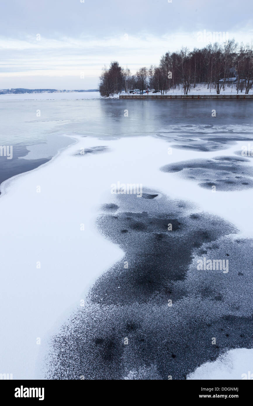 Thin ice at lake Stock Photo - Alamy