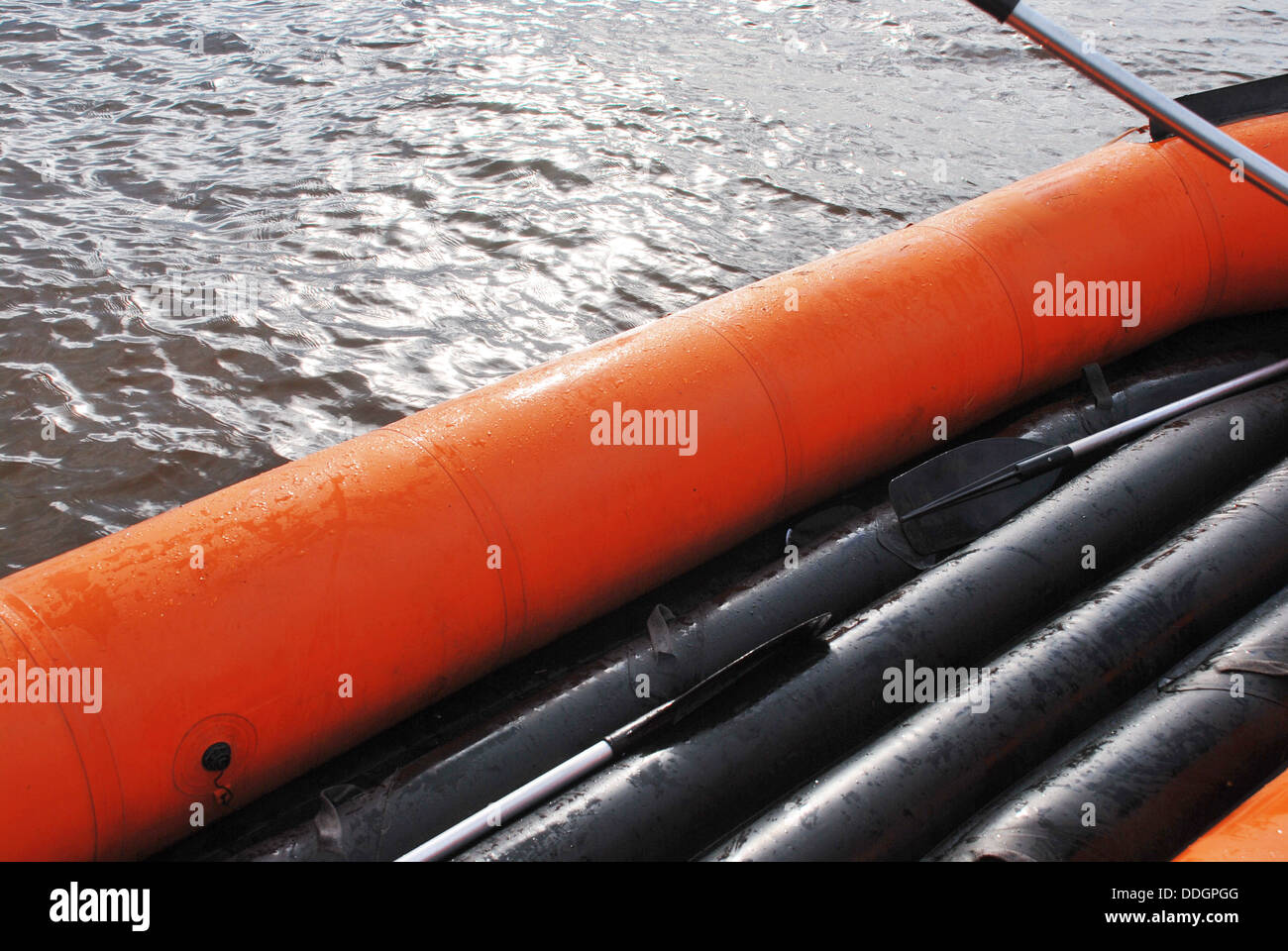 empty inflatable raft on the water, horizontal Stock Photo - Alamy