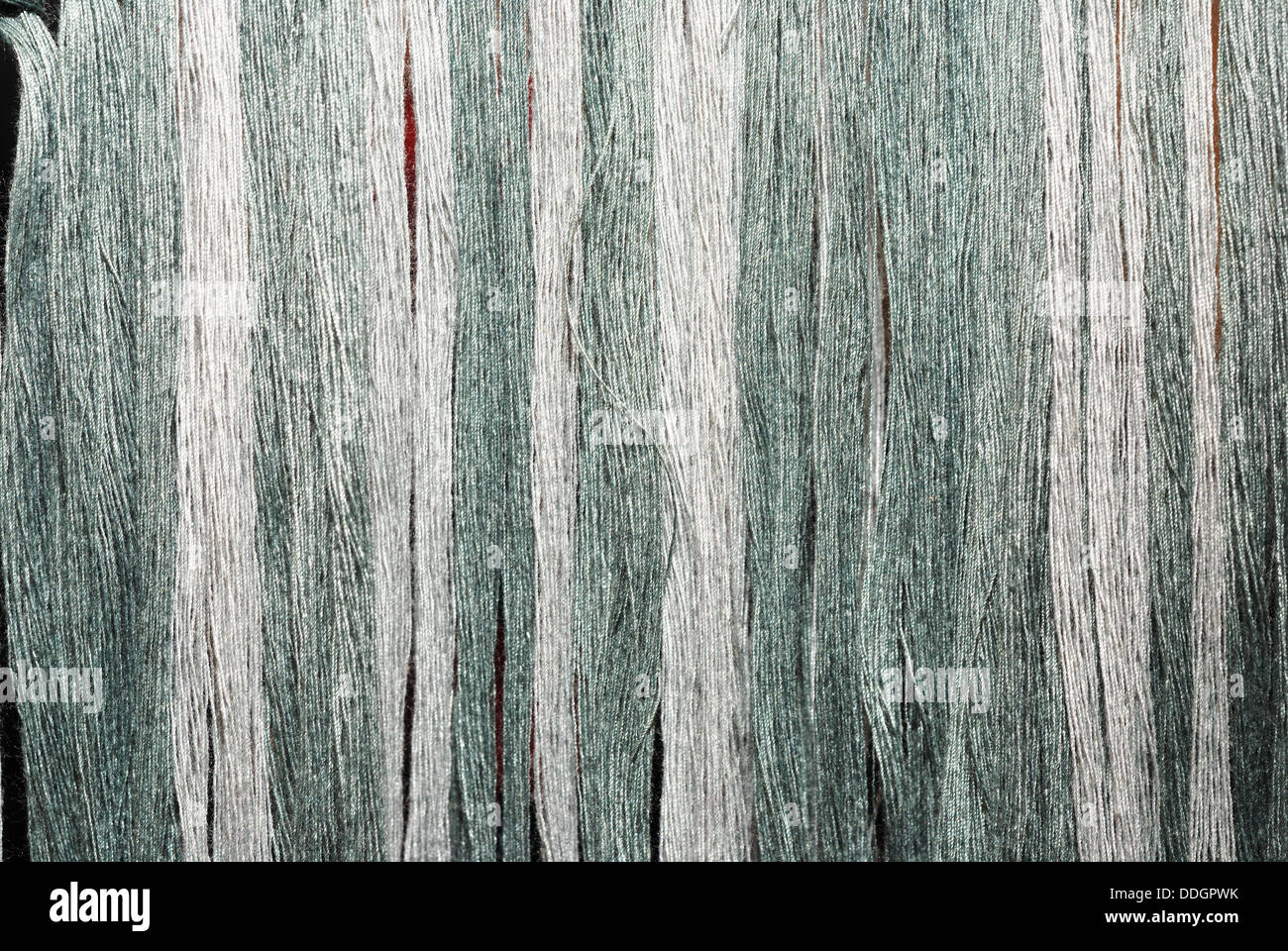 background of gray and the green thread Stock Photo - Alamy
