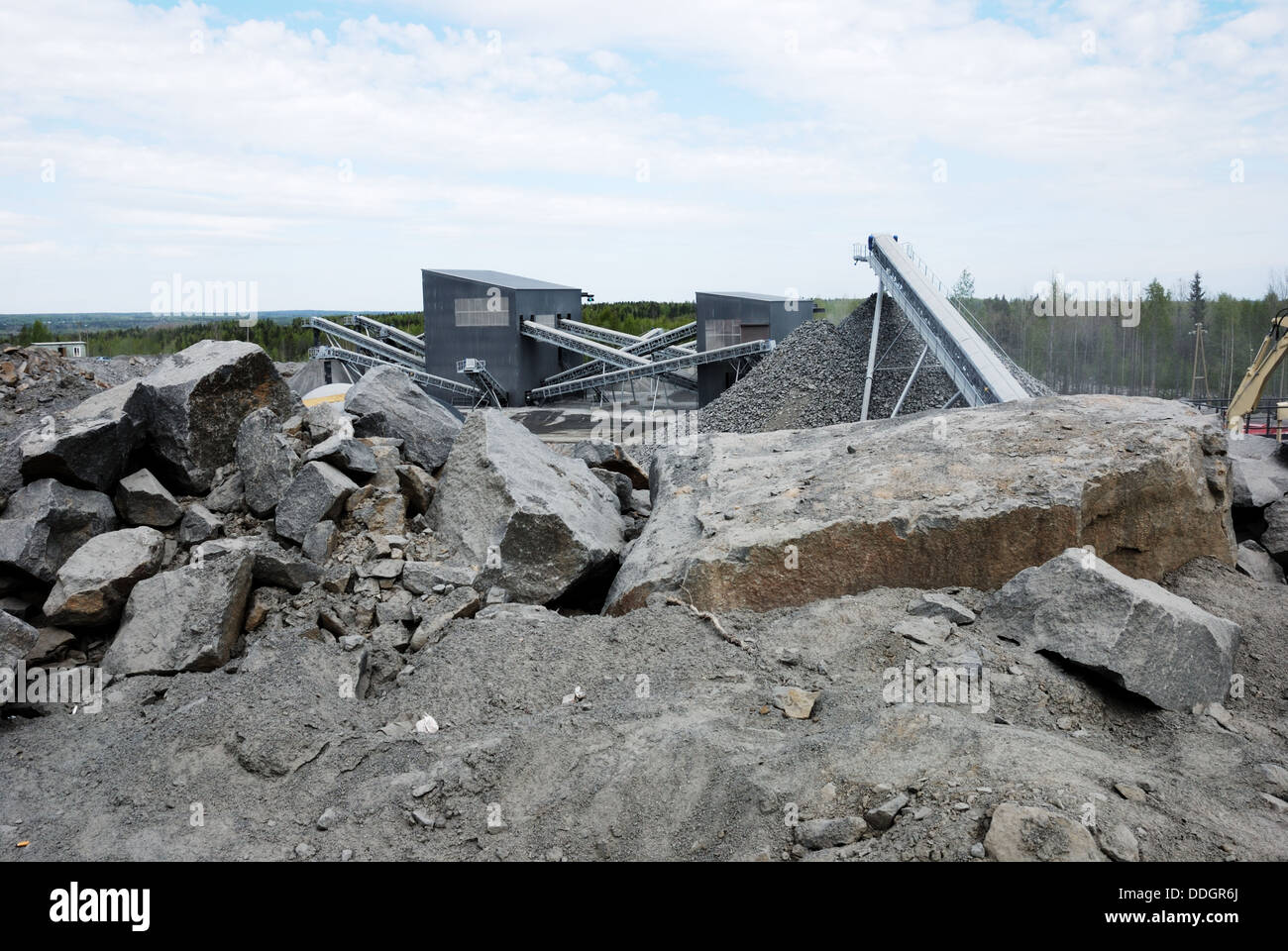 making of crushed stone at stone quarry Stock Photo - Alamy