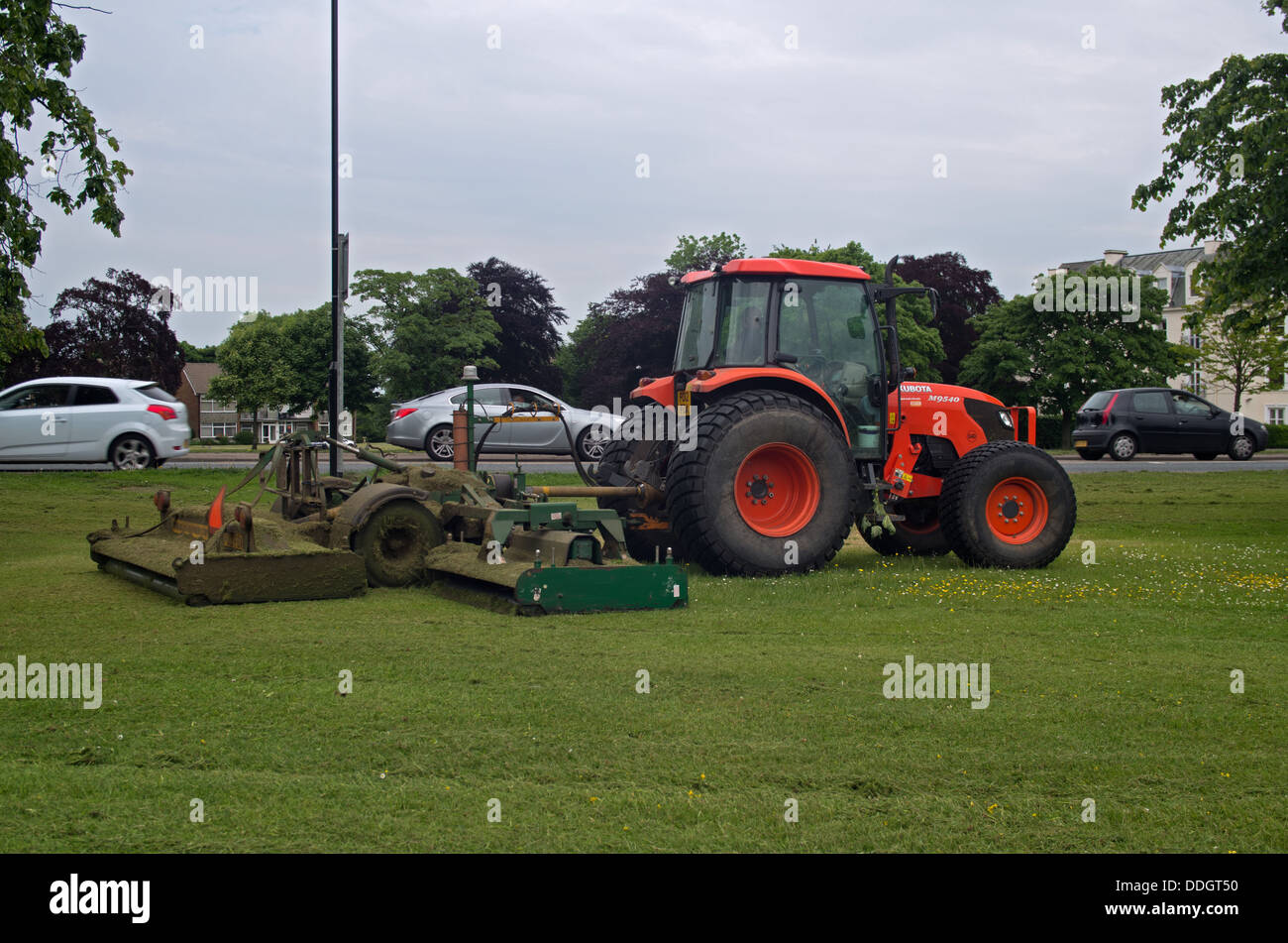 Tractor cutting grass hi-res stock photography and images - Alamy