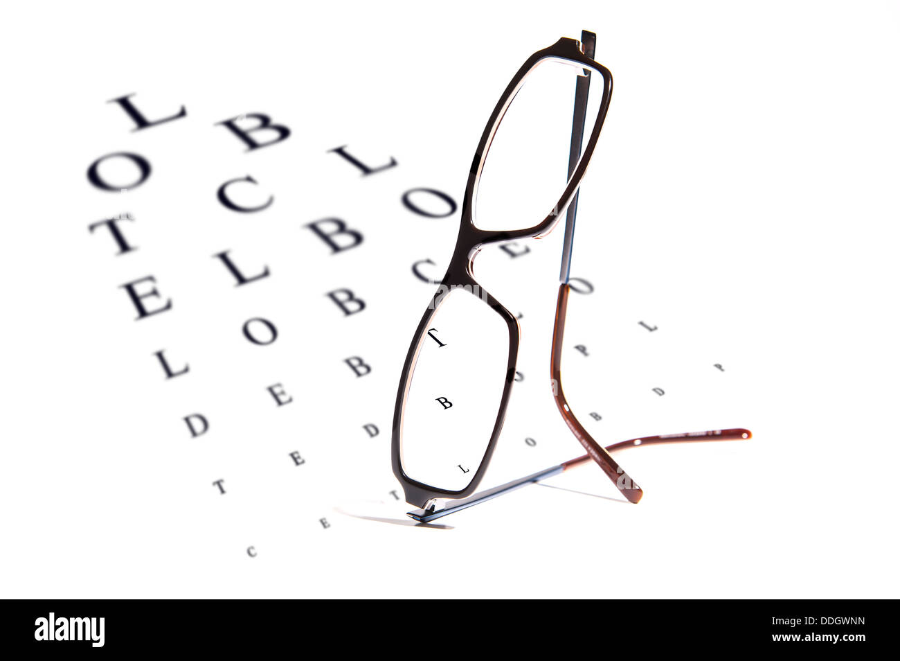 Vision testing chart and glasses Stock Photo - Alamy