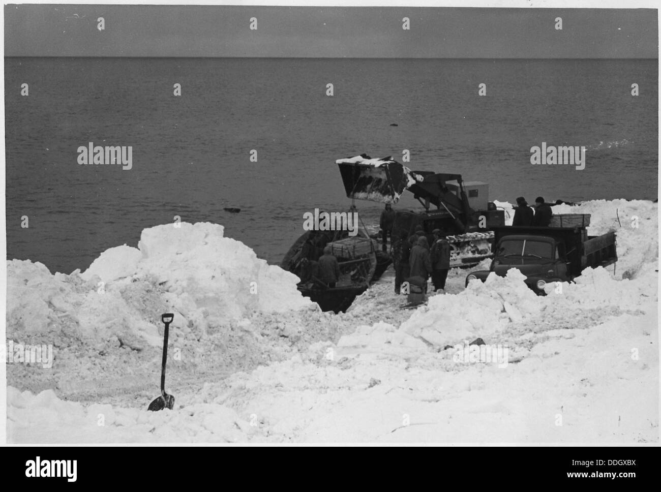 The crew of the Penguin II is unloading cargo at Zapadni Beach on St ...