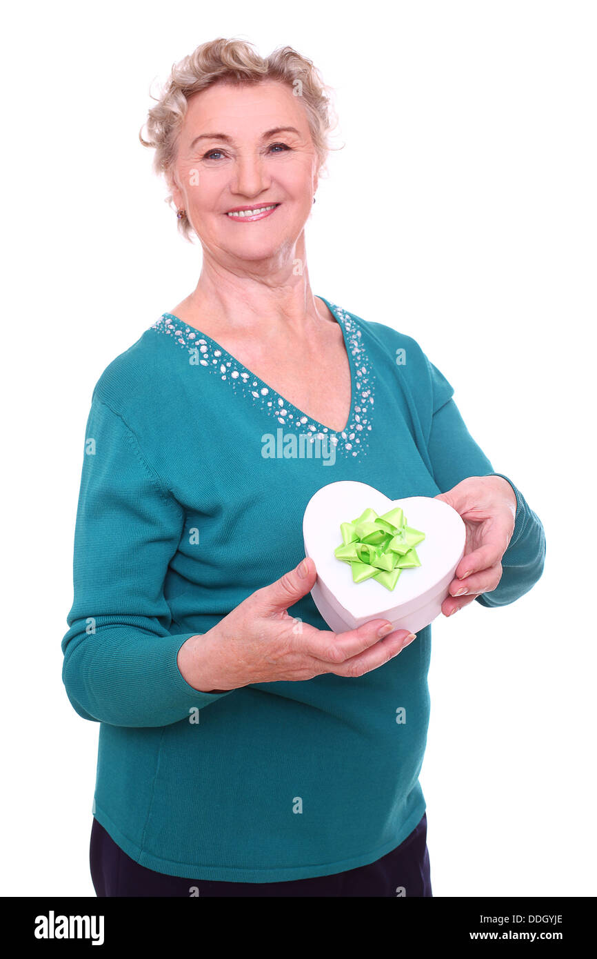 Happy old lady with gift Stock Photo - Alamy